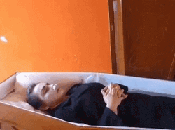 Coffin Open Casket Person Alive GIF | GIFDB.com