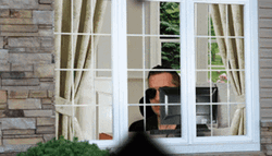 Cool Man Looking Out The Window GIF | GIFDB.com