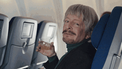 Creepy Guy On The Airplane GIF | GIFDB.com