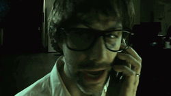 Creepy Guy Talking To His Phone GIF | GIFDB.com