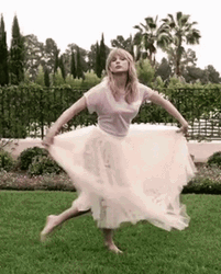 Playful Curtsy Taylor Swift White Dress GIF | GIFDB.com