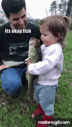 Cute Baby Holding Fish GIF | GIFDB.com