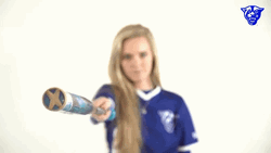 Cute Softball Woman Holding Bat GIF | GIFDB.com