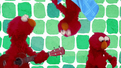 Dancing Elmo While Elmo Playing Guitar GIF | GIFDB.com