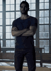 Derek Hale Standing Arms Folded Serious GIF | GIFDB.com