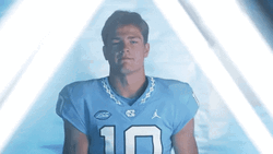 Drake Maye Throwing Blue Football Into The Air GIF | GIFDB.com