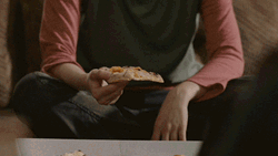 Elizabeth Hurley Eating Pizza GIF | GIFDB.com