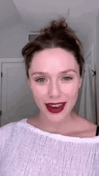 Elizabeth Olsen Winking GIF | GIFDB.com