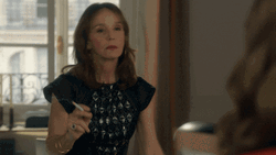 Emily In Paris Sylvie Blow Smoke GIF | GIFDB.com