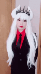 Emiru Helltaker Cosplay Smiling Wickedly GIF | GIFDB.com