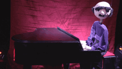 Eyebrows Raise Perfoming Puppet Show GIF | GIFDB.com