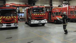 Firefighter Carrying A Ladder GIF | GIFDB.com