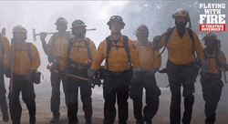 Firefighter Playing With Fire GIF | GIFDB.com
