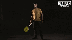 Francis Tiafoe Playing With His Racket GIF | GIFDB.com