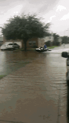Funny Jet Ski Speeding Up In Monsoon Flood GIF | GIFDB.com