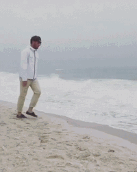 Funny Man Disappearing On Beach Sand GIF | GIFDB.com