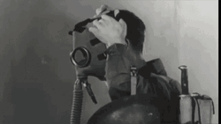 Gas Mask Man Grim Necessity GIF | GIFDB.com