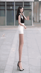 Gaunt Long Legs Tall Lady GIF | GIFDB.com