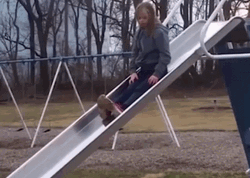 Girl Slowly Going Down The Slide GIF | GIFDB.com