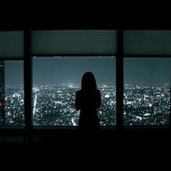 Girl Standing And Looking Out The Window GIF | GIFDB.com