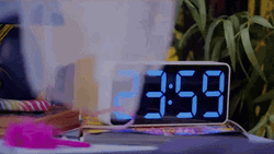 Girl Waking To Digital Clock Alarm GIF | GIFDB.com