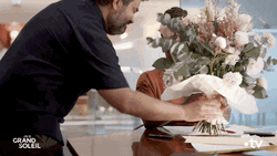 Giving Flowers To A Workmate GIF | GIFDB.com