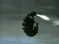 Godzilla Meme Blowing Smoke GIF | GIFDB.com