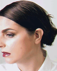 Gorgeous Woman Turning Head Looking Away GIF | GIFDB.com