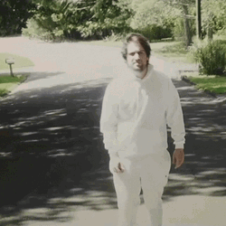 Guy In All White Outfit Walking Backwards GIF | GIFDB.com