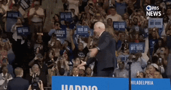 Guy Runs Hugs Harris Walz GIF | GIFDB.com