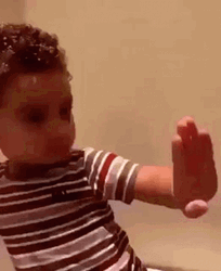 Hilarious Kid Inspecting Own Hand GIF | GIFDB.com