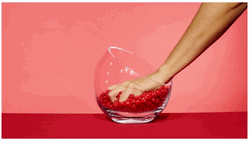Handful Of Red Candies GIF | GIFDB.com