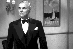 Hands On Hips Vintage British Actor GIF | GIFDB.com