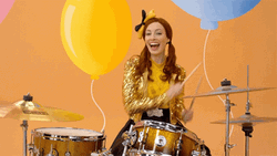 Happy Emma Watkins Playing Drum GIF | GIFDB.com