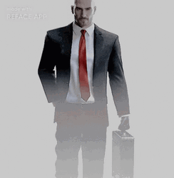 Hitman Firing His Gun GIF | GIFDB.com
