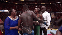Israel Adesanya Hugging And Kissing Loved Ones GIF | GIFDB.com