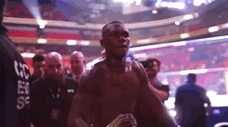 Israel Adesanya Showing Off His Belt GIF | GIFDB.com