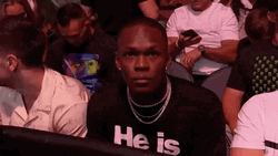 Israel Adesanya Sitting In The Audience GIF | GIFDB.com