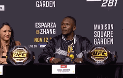 Israel Adesanya Waving To The Audience GIF | GIFDB.com