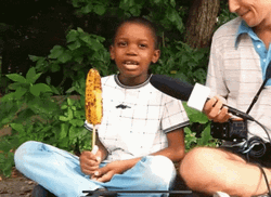 Its Corn Happy Kid Getting Interviewed GIF | GIFDB.com