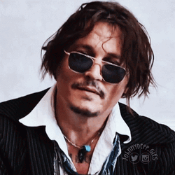 Johnny Depp Looking With Sunglasses GIF | GIFDB.com