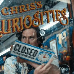 Just Beyond Henry Thomas Turning Closed Sign GIF | GIFDB.com