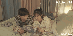 Korean Dreama Couple Reading And Cuddling In Bed GIF | GIFDB.com