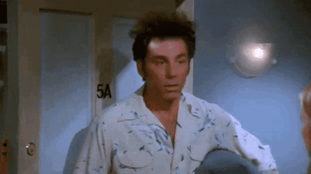 Seinfeld Kramer Awkward Smile GIF | GIFDB.com