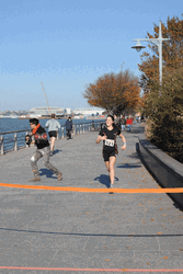 Lady Runner Happily Reaching Finish Line GIF | GIFDB.com