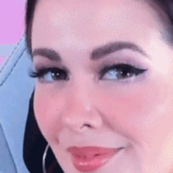 Larkin Love Wink With Hand Gesture Heart GIF | GIFDB.com