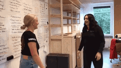 Laughing Women Chest Bump GIF | GIFDB.com