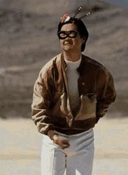 Leslie Chow Slight Smirk GIF | GIFDB.com