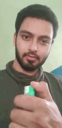 Smiling While Lighting A Lighter GIF | GIFDB.com