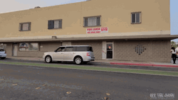 Lowrider Car Passing By GIF | GIFDB.com